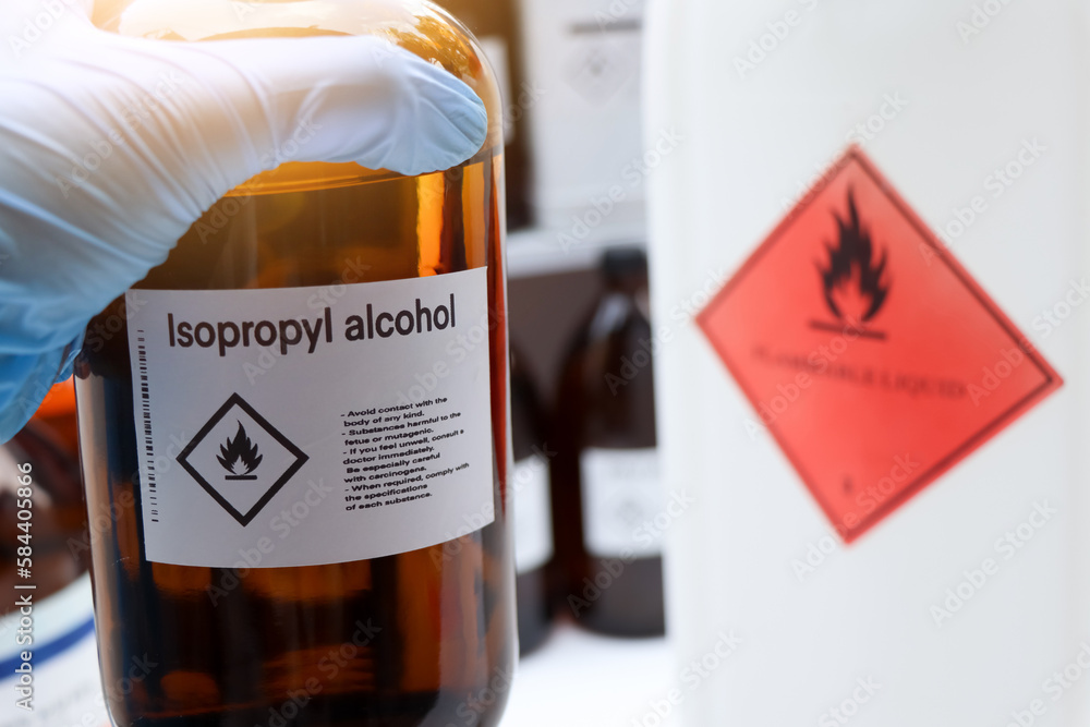 Isopropyl alcohol in glass,Hazardous chemicals and symbols on ...