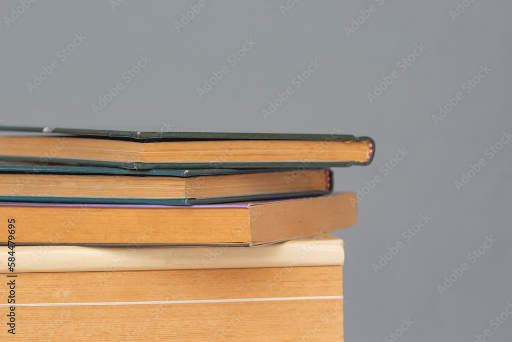 Stack of Books that can be seen on the left side Stock Photo | Adobe Stock