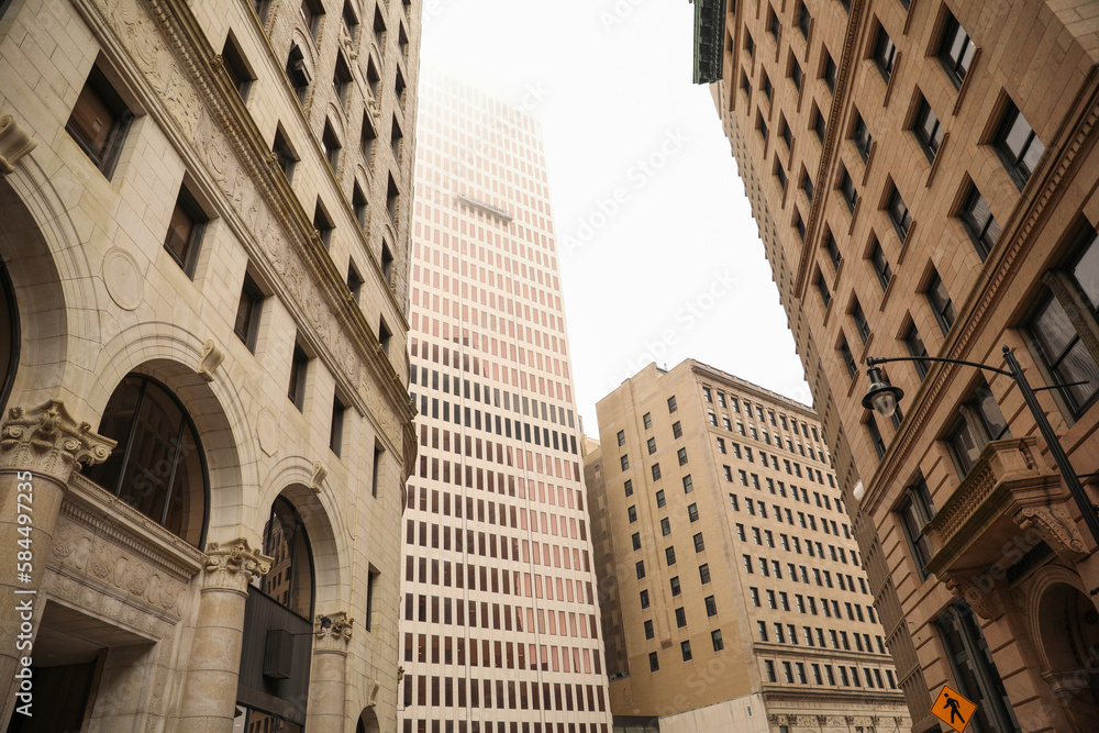 skyscraper's towering structure and old-fashioned architecture ...