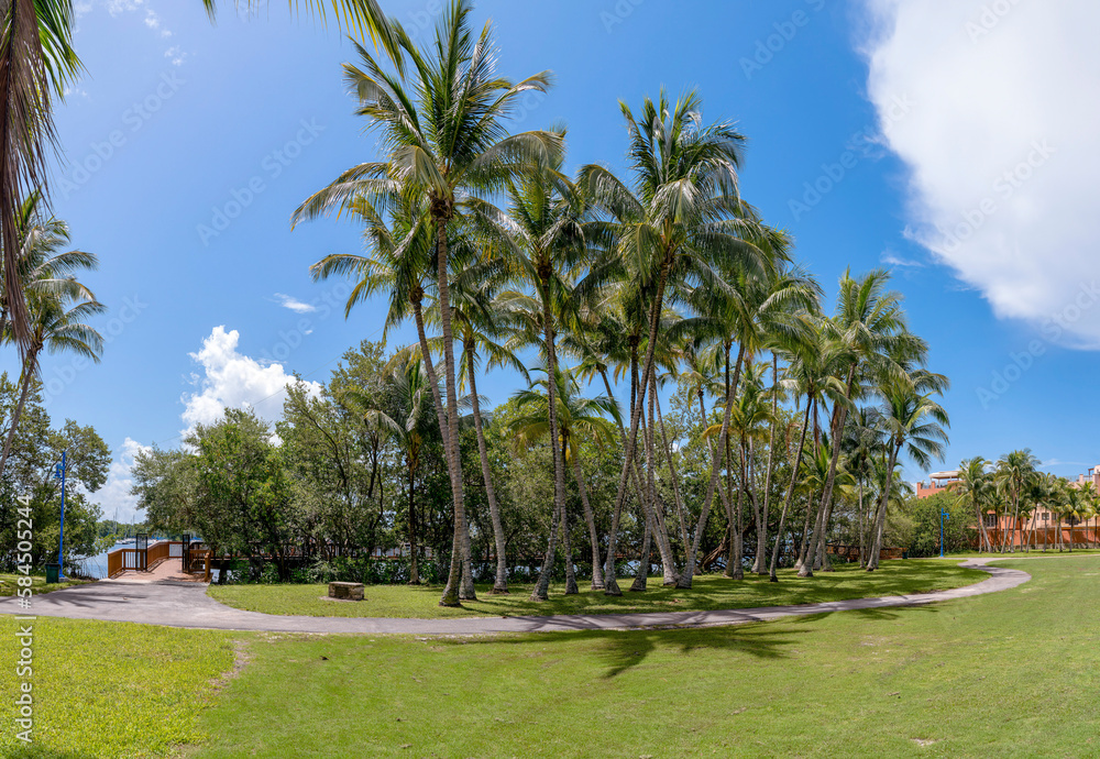 MIAMI, FLORIDA - CIRCA JULY, 2022: Concrete path connected to the ...
