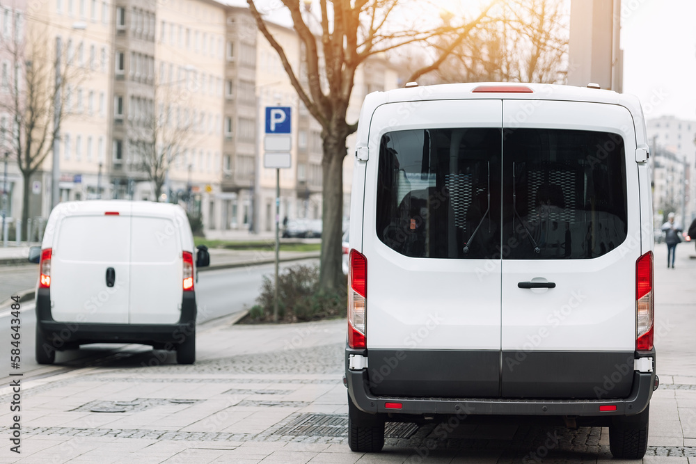 Stockfoto Small cargo delivery van parked in european city central ...