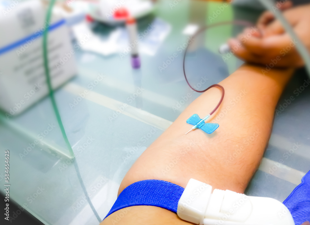 Blood collection using venipuncture technique in arm for biological ...