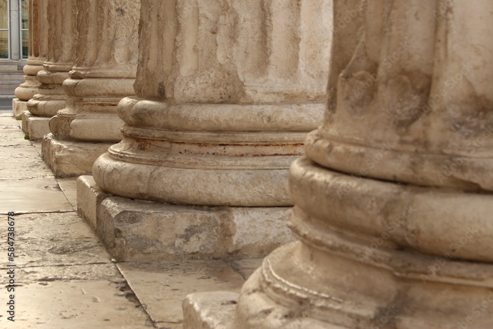 Low angle of the base of the Roman columns in front of the ancient ...