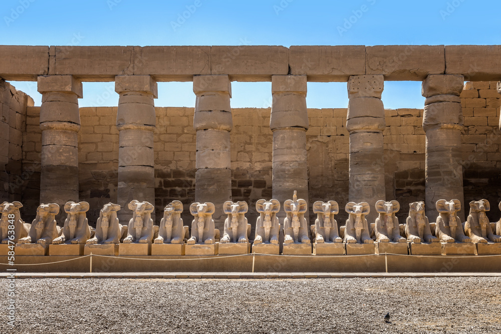 Rams statues located behind temple of Amun-Ra in Karnak temples Stock ...