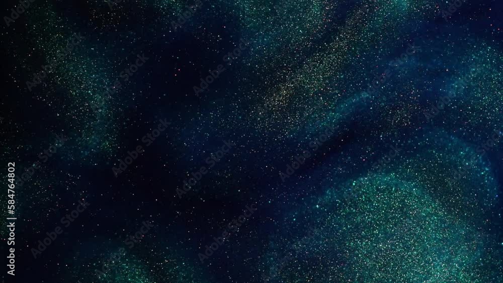 Mesmerizing Slow-Motion 4K Footage of Gold Dust Particles in a Blue ...
