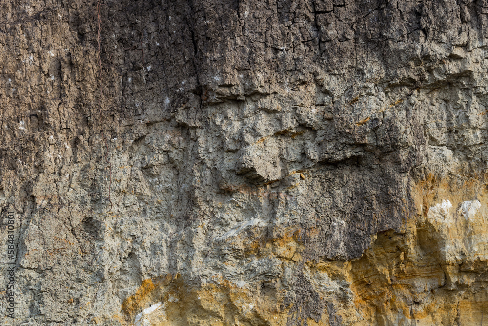 Sedimentary rocks with a high content of iron oxide. Red soil, loam ...