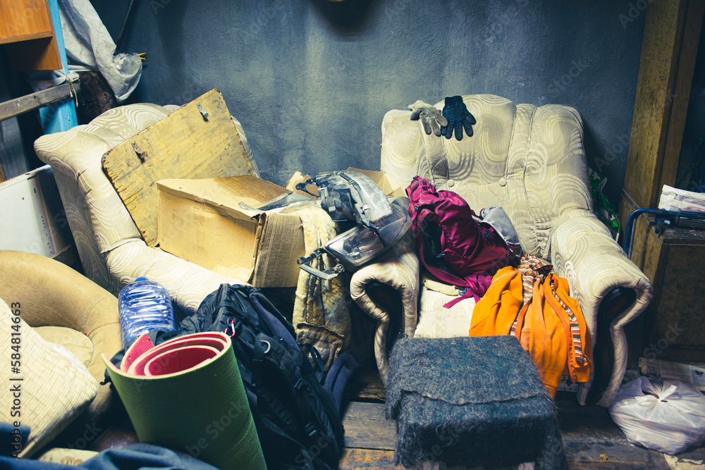junk in the garage lying in a chaotic and chaotic position, the front ...