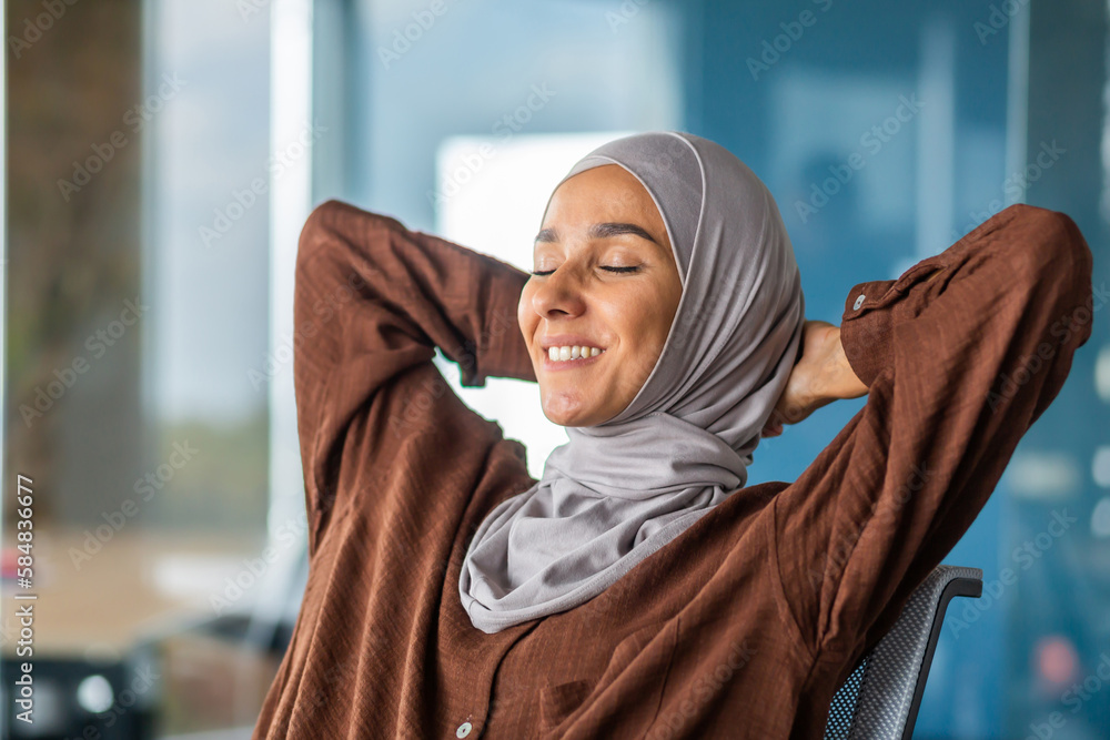 Business woman in hijab resting, Arab woman in hijab with her hands ...