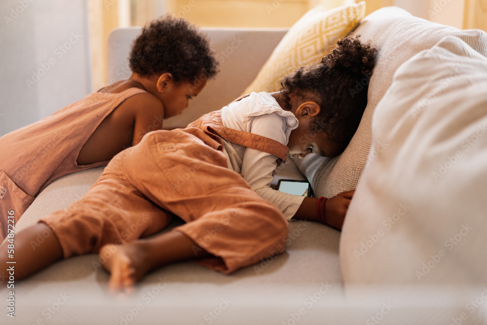 Kids Watching Cartoons On The Phones Stock Photo | Adobe Stock