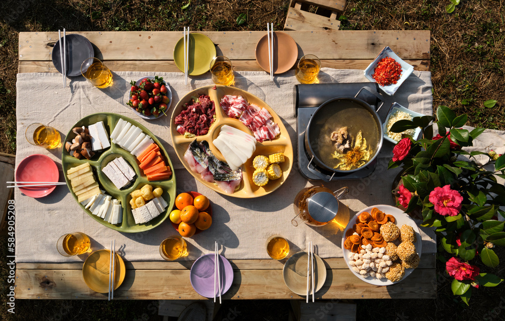 Chinese style hot pot picnic in outdoor natural field, closeup Stock ...
