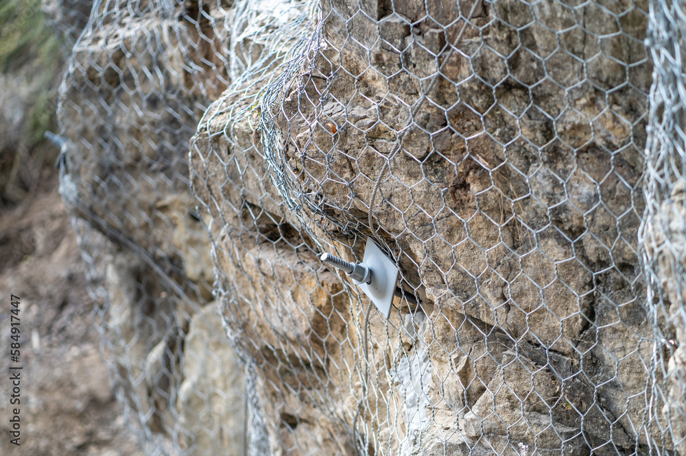 Reinforcing mountain slope with metal mesh and concrete reinforcement ...