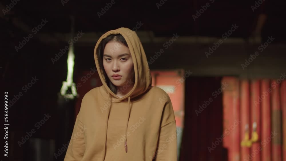 Video „Portrait of street gang style attractive Asian young woman in ...