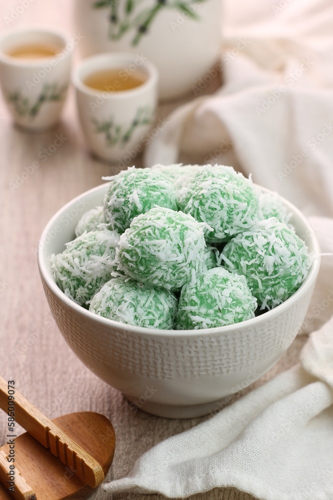 Klepon or kelepon, is a snack of sweet rice cake balls filled with ...