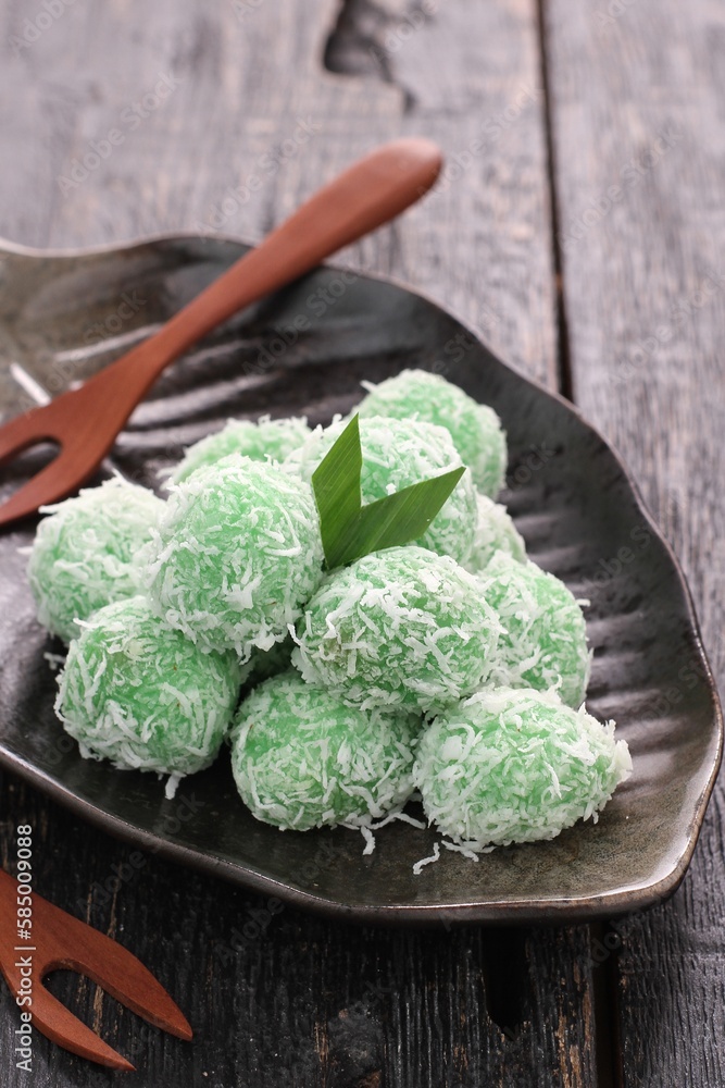 Klepon or kelepon, is a snack of sweet rice cake balls filled with ...
