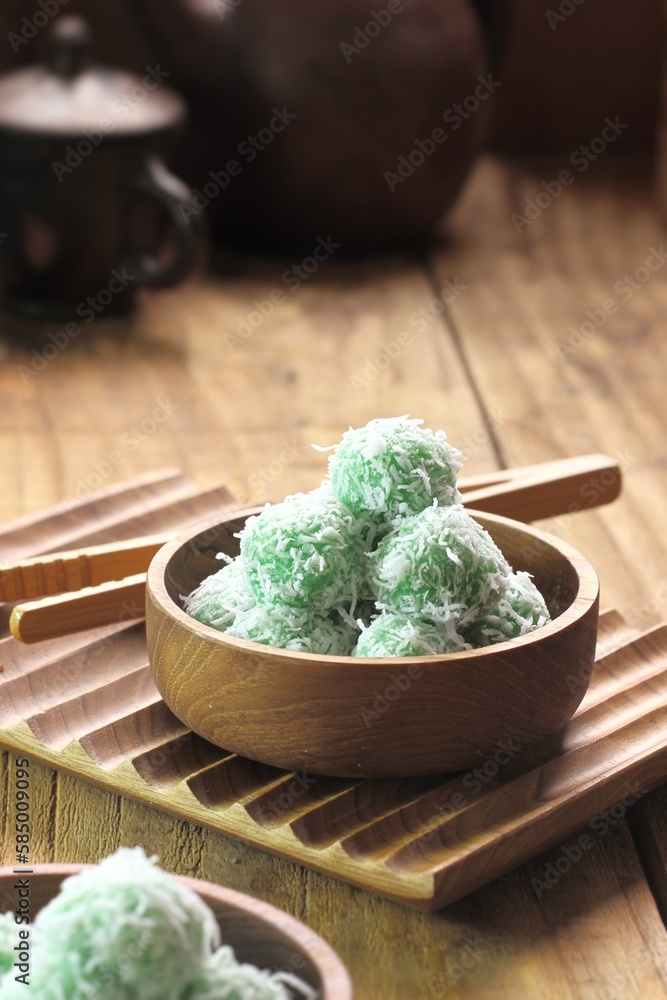 Klepon or kelepon, is a snack of sweet rice cake balls filled with ...