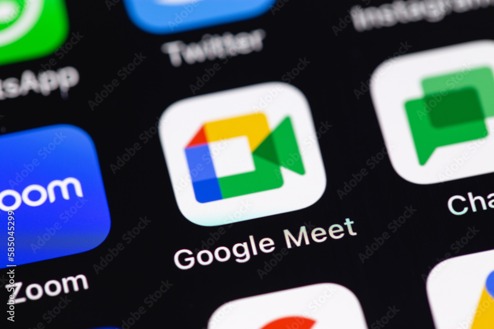 Google Meet icon mobile app on screen smartphone iPhone closeup. Google Meet is a video calling ...