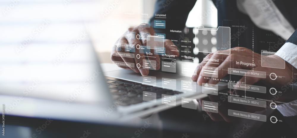 Business developer using Kanban board framework on laptop computer ...