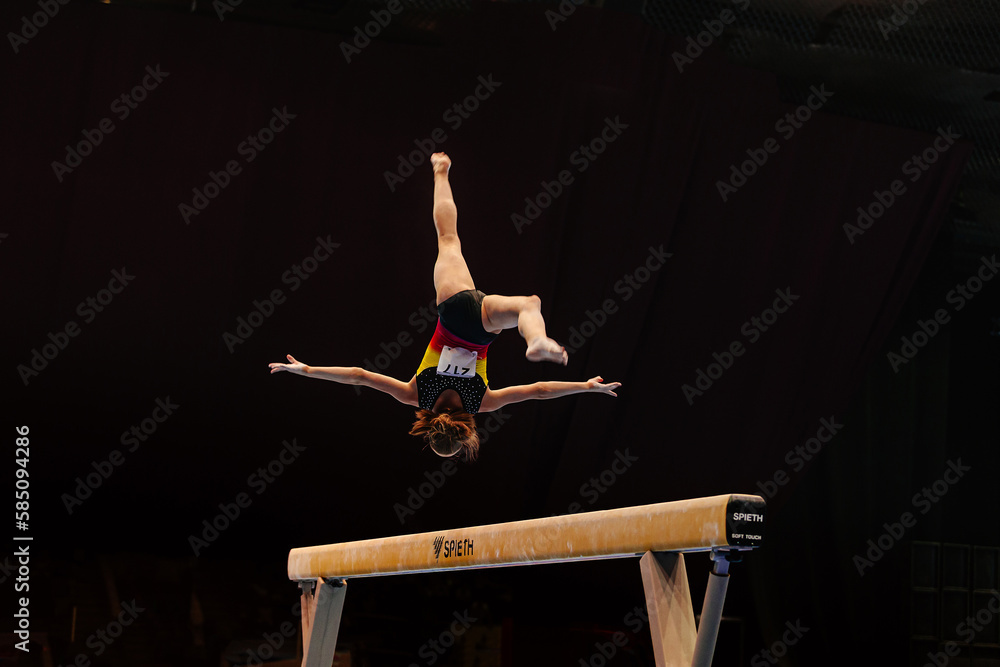 female gymnast performing exercise balance beam Spieth model Soft touch ...