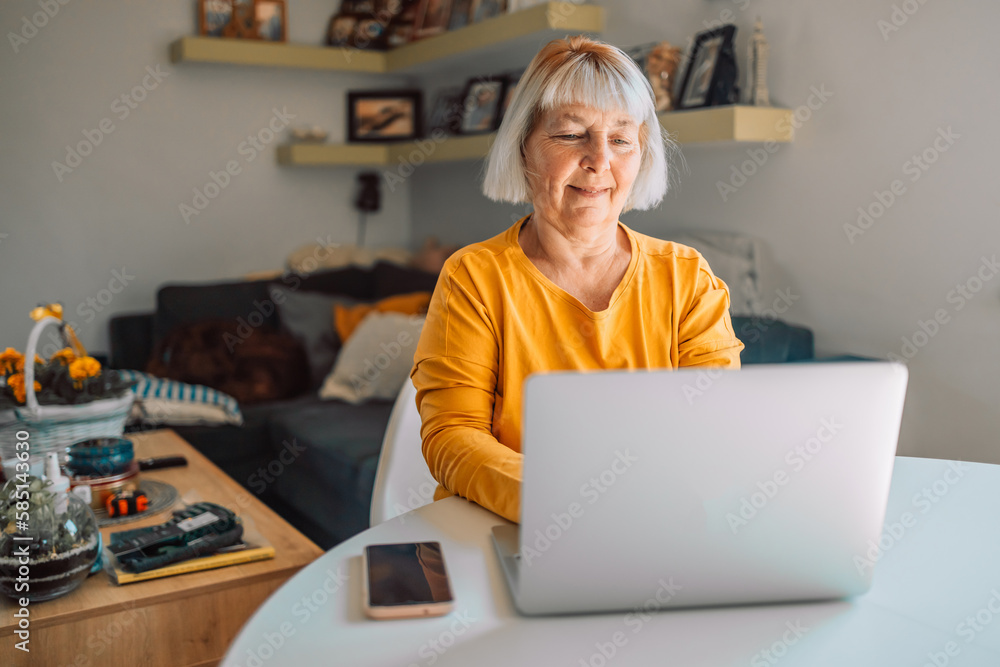 Senior mature older woman watching business training, online webinar on ...