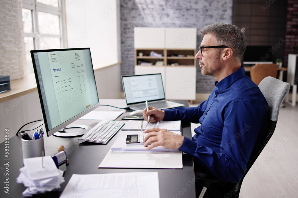 Accountant Using E Invoice Software At Computer Stock Photo | Adobe Stock