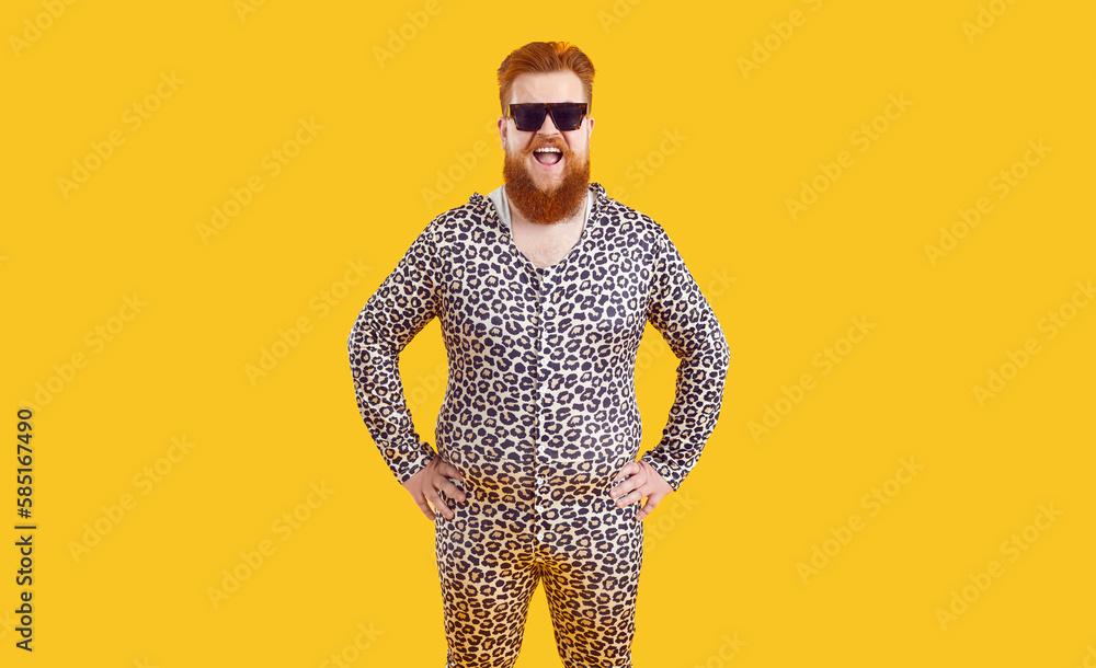 Portrait Of Funny Comic Fat Man In Leopard Pajamas Who Laughs Out Loud