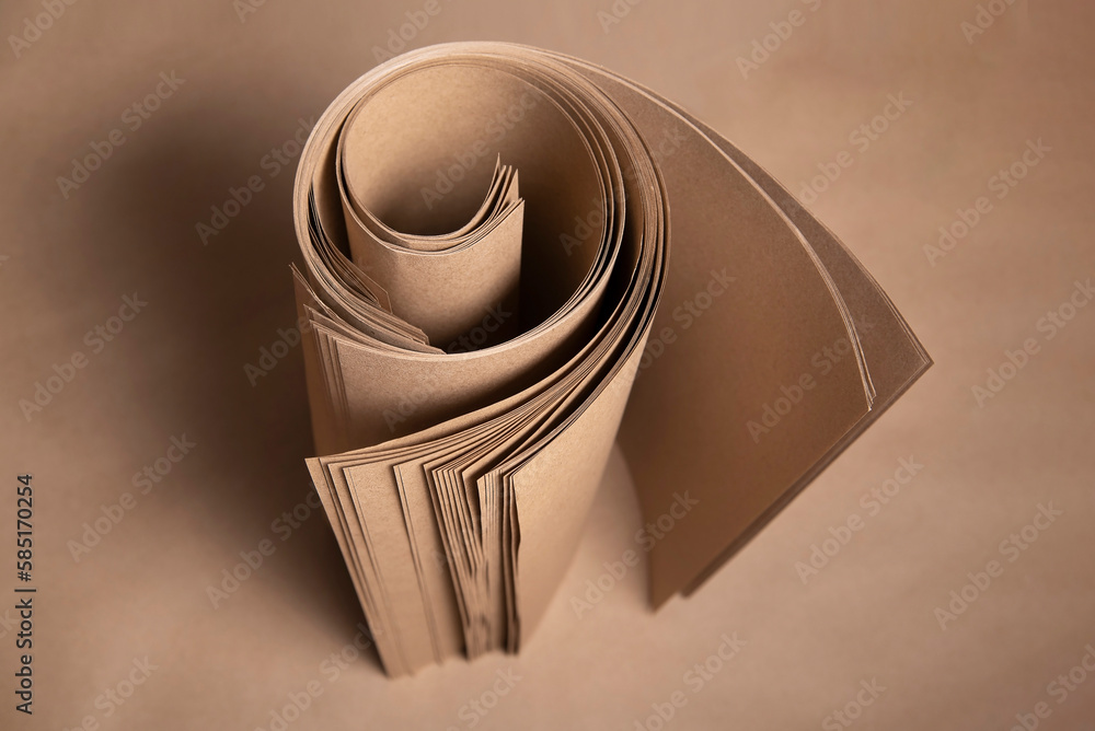 Brown kraft paper twisted into a roll for packaging various products ...
