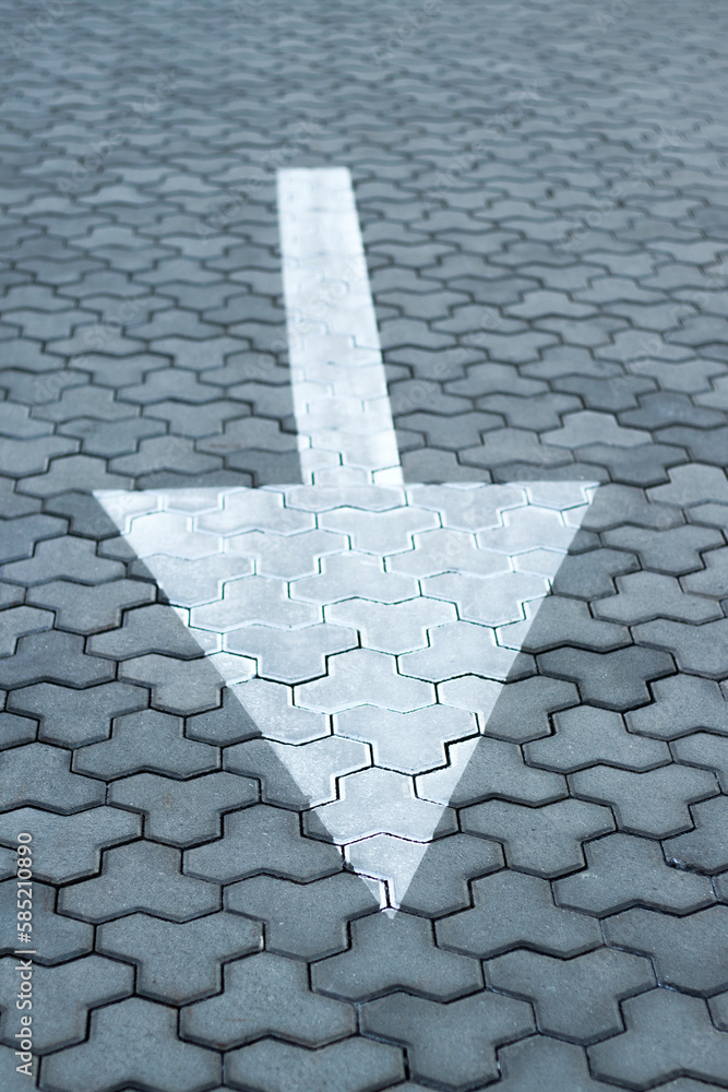 arrow direction on the floor. Open space with road signs and road ...