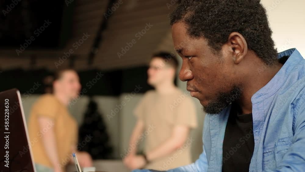 Black Man Writing Lines of Code On Desktop PC With Two Monitors and a ...