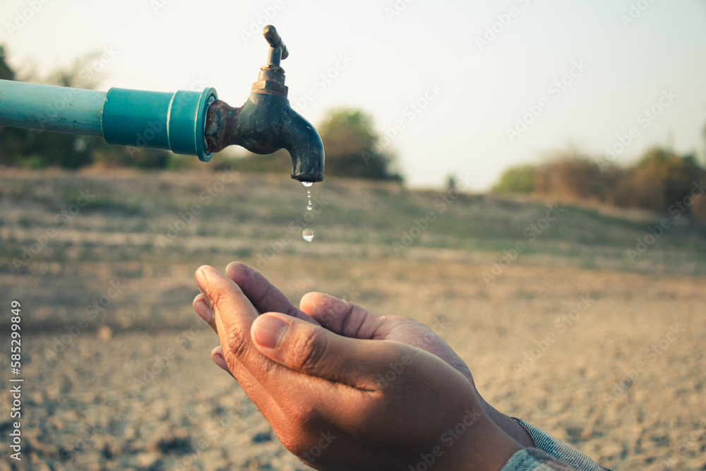 Hand for drinking water to live through drought, Concept drought and ...