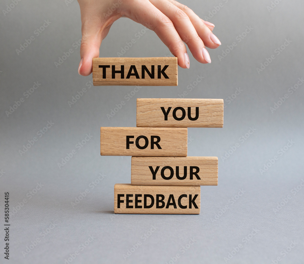 Feedback symbol. Wooden blocks with words Thank you for your Feedback ...