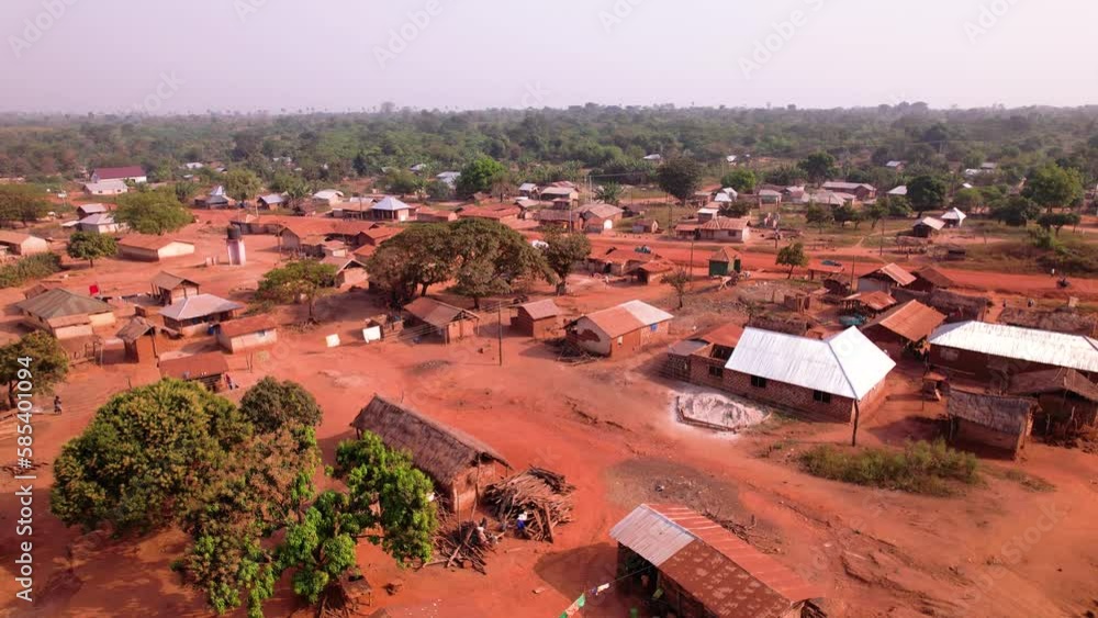 Drone shots and aerial view of dusty roads and dilapidated buildings in ...