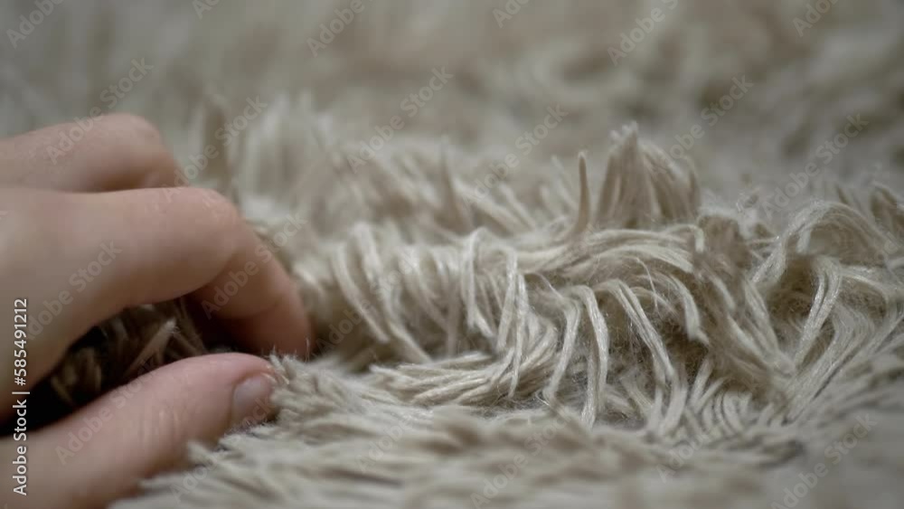 Girl Touching the Surface of a Beige Soft Warm Wool Blanket with her ...