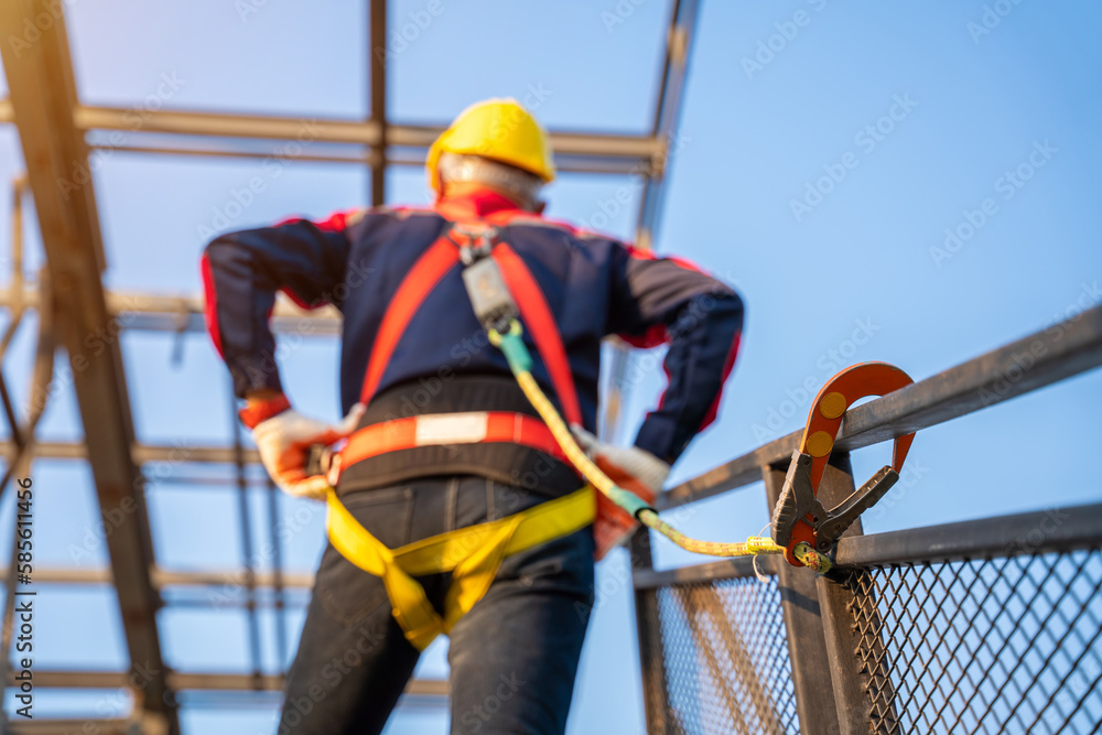 A worker working at height equipment. Fall arrestor device for worker ...