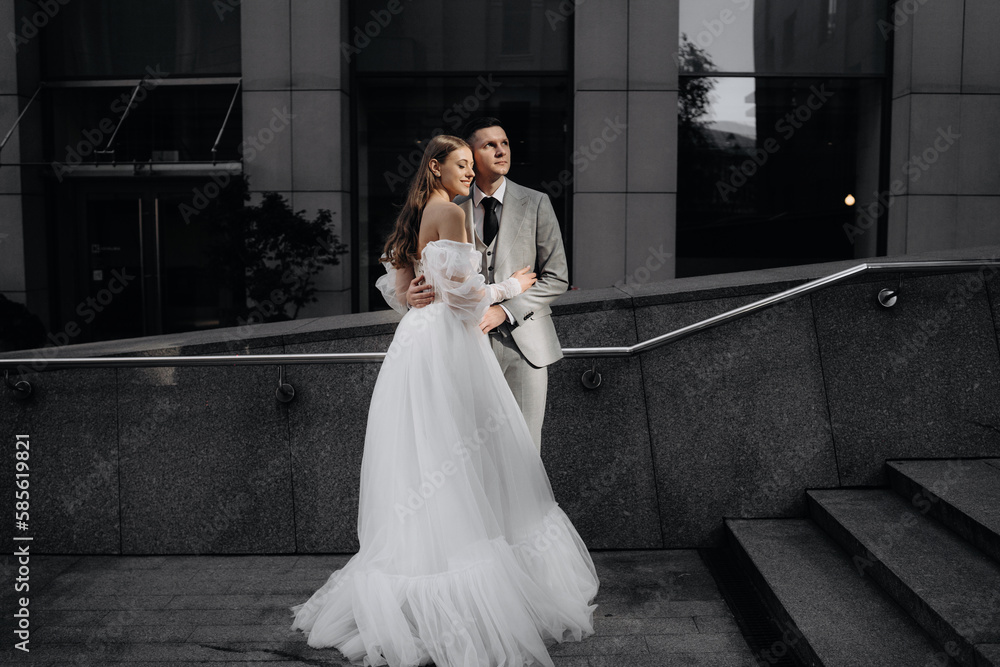 Full lengths portrait of young amazing just married spouses enjoy ...