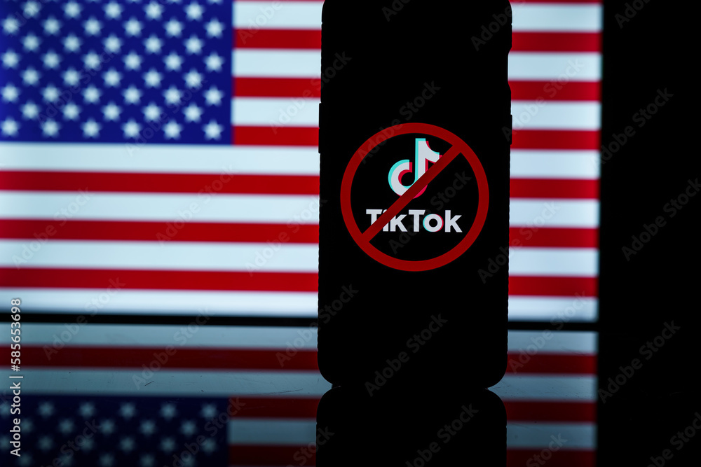 TikTok logo with ban icon in background of USA flag. Sanctions on Tik ...