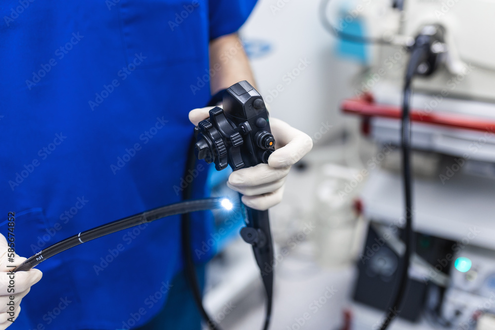 Endoscopy at the hospital. Doctor holding endoscope before gastroscopy ...