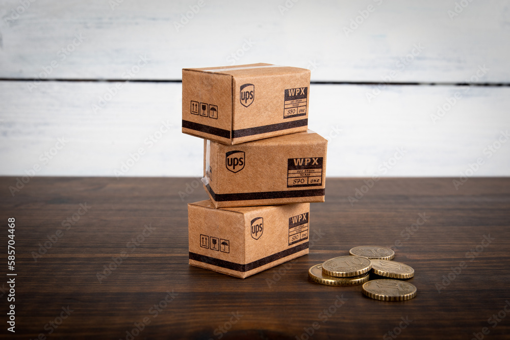 UPS cardboard packaging boxes in stack. Mail and parcel delivery Stock ...