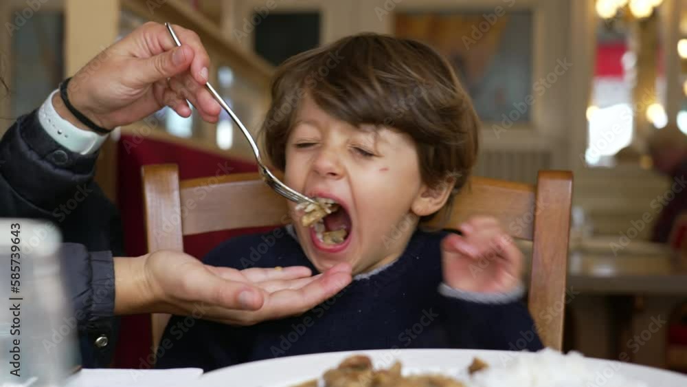 Child reaction to HOT food. One little boy reacting to Spicy burning ...