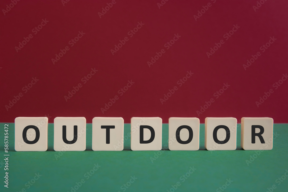Word OUTDOOR written with leisure game tiles. Conceptual image ...