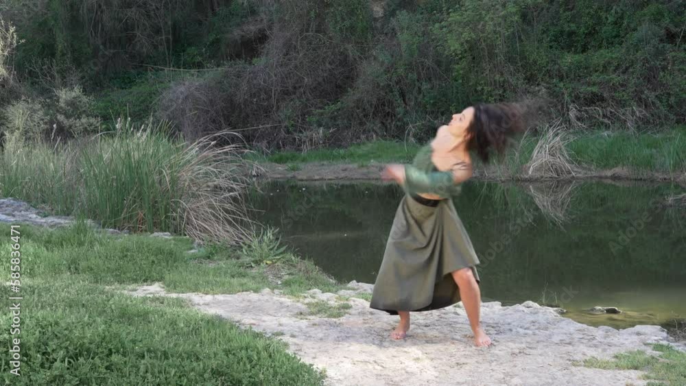 Nature's dance partner: A woman and the river. Connection between a ...