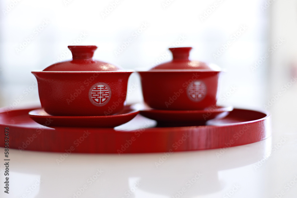 Traditional Chinese tea ceremony cups in serving tray with the symbol ...