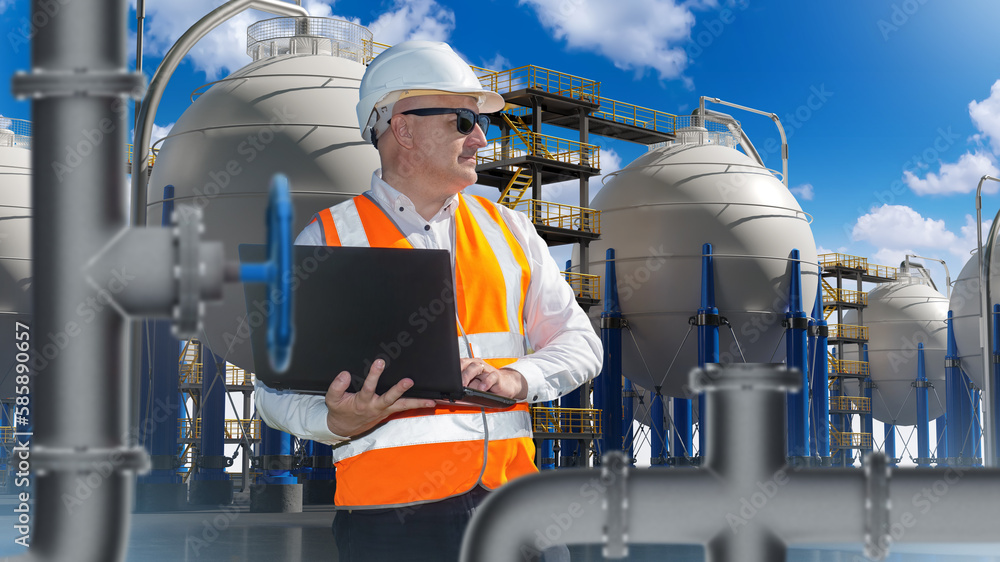 Gas compressor station engineer. Man with laptop. Maintenance of gas ...