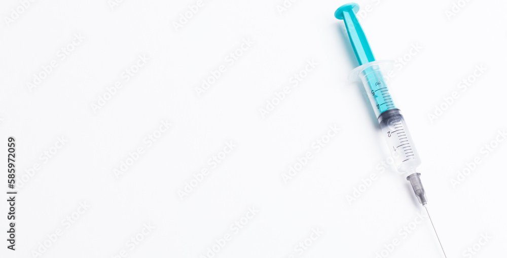 Disposable plastic syringe prepared for injection and vaccination in ...