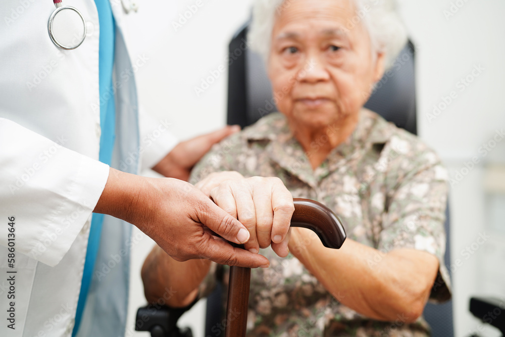 Doctor help Asian elderly disability woman patient holding walking ...