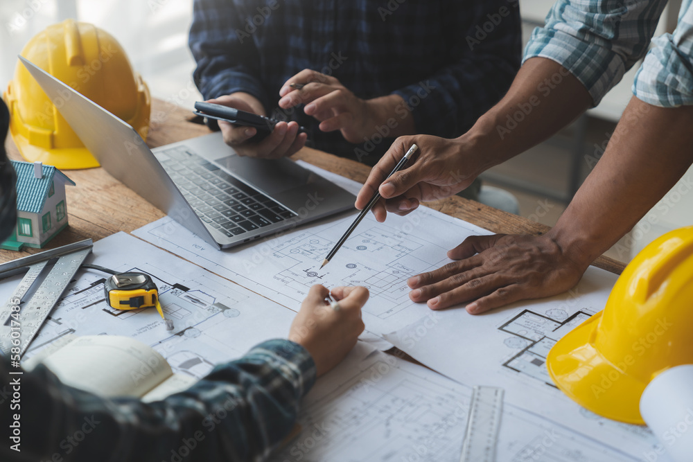 Architectural engineer team meeting Drawing and calculations for ...