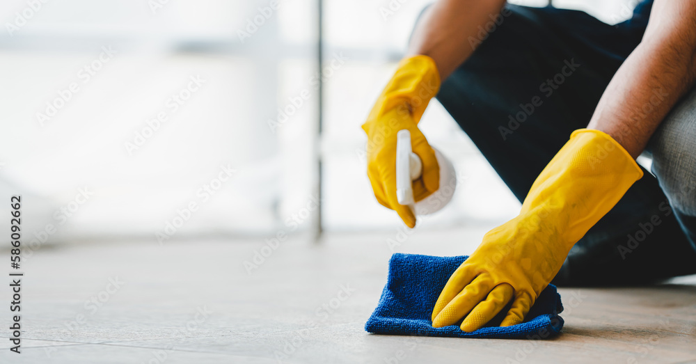 people doing cleaning are using cloths and spraying disinfectant Wipe ...