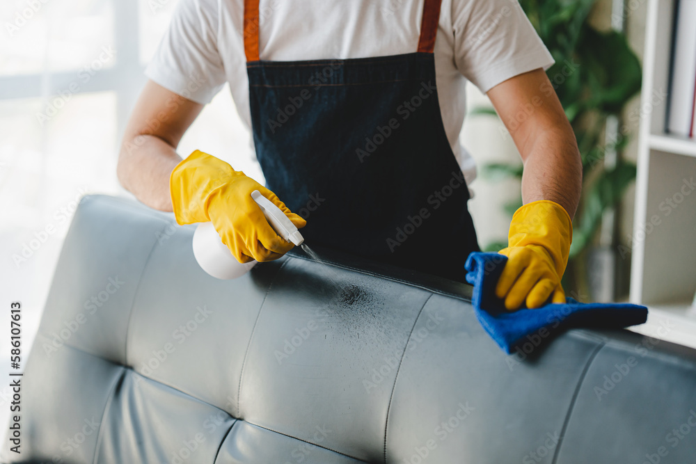 people doing cleaning are using cloths and spraying disinfectant Wipe ...