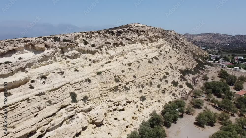 Vídeo do Stock: Aerial drone view of famous Matala beach with caves ...