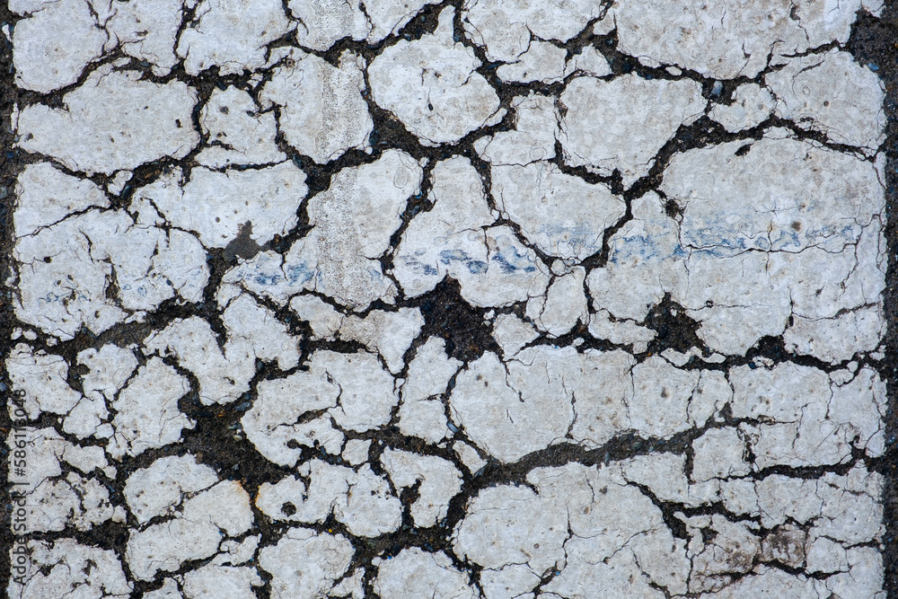 Textured surface of the pavement creates a striking contrast against ...