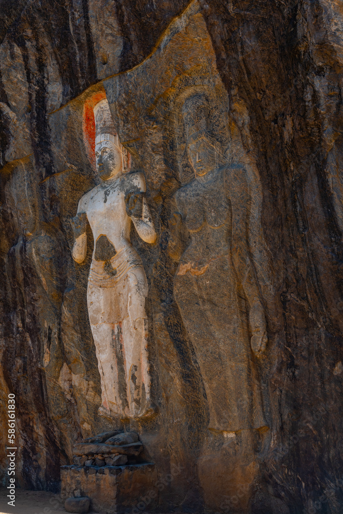 Buddha statues carved into stone at buduruwagala ancient site at Sri ...